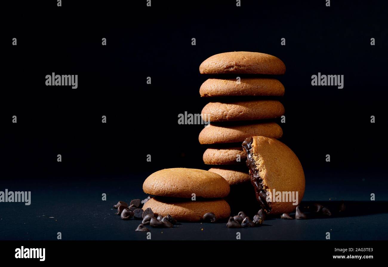 BISCUITS - Stack of delicious cream biscuits filled with chocolate ...