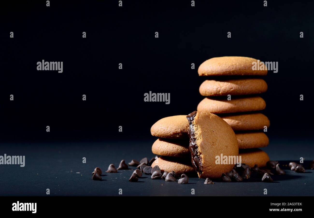BISCUITS - Stack of delicious cream biscuits filled with chocolate ...