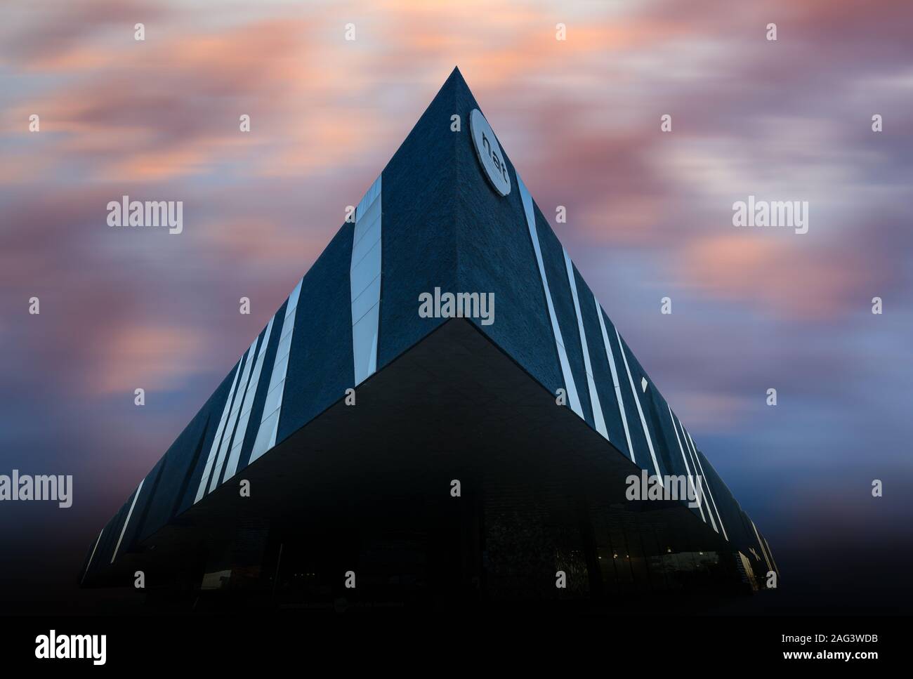 Beautiful pyramid shaped building under a colorful sky Stock Photo - Alamy