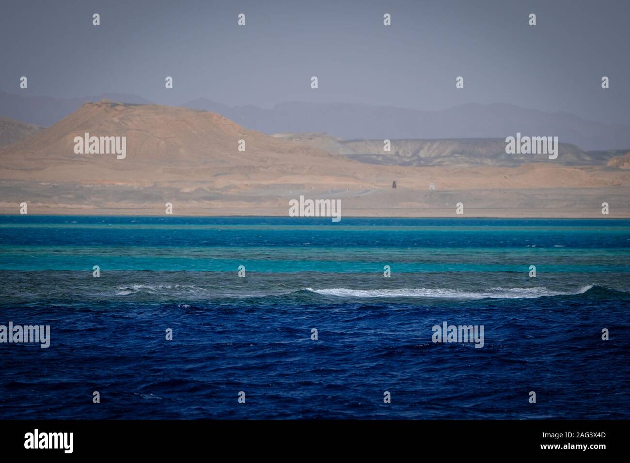 Beautiful blue calm sea by the beach Stock Photo - Alamy