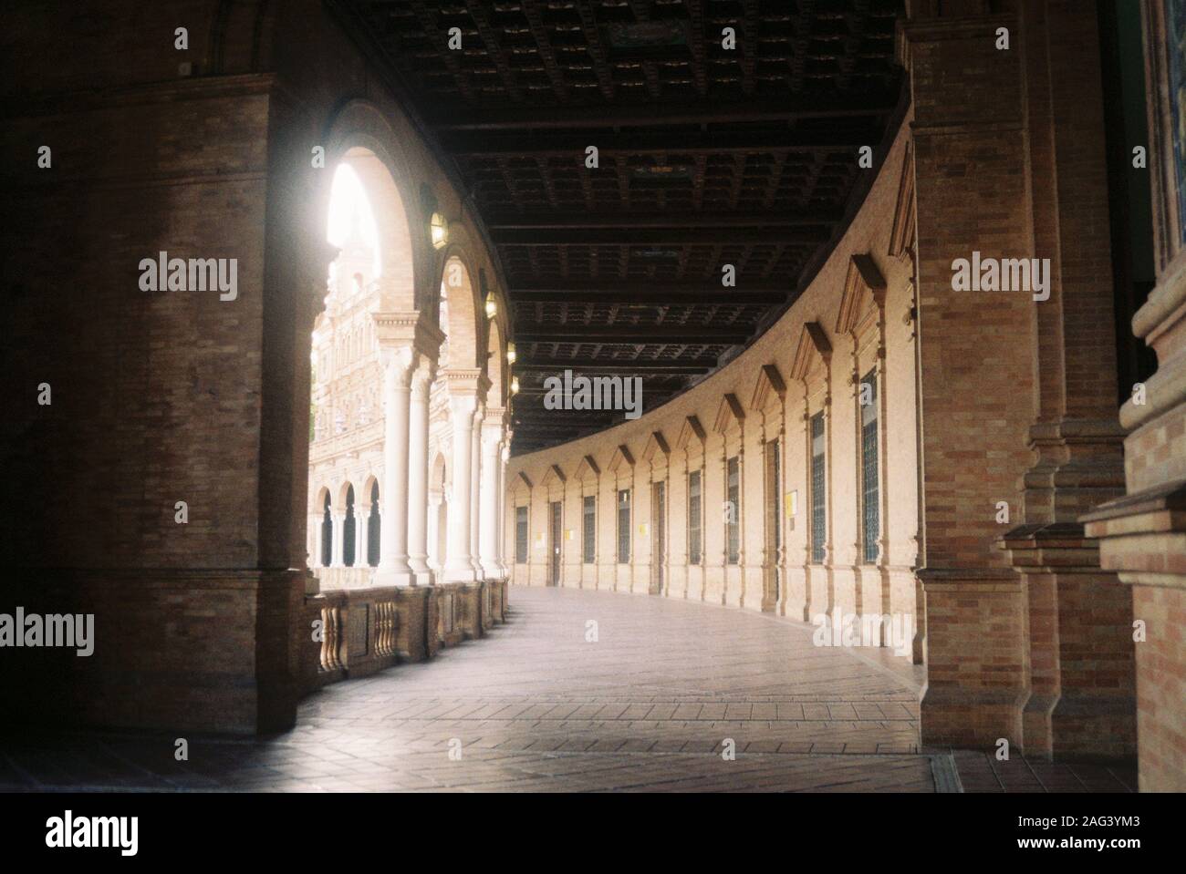 Beautiful shot of the inside of a building with arches and bright sun ...