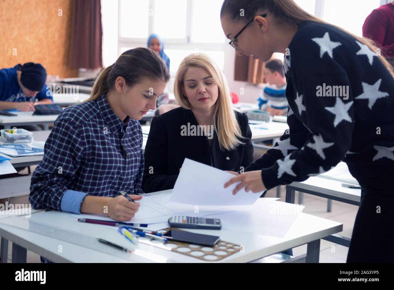 Female Architecture teacher at work. Female professor explain ...