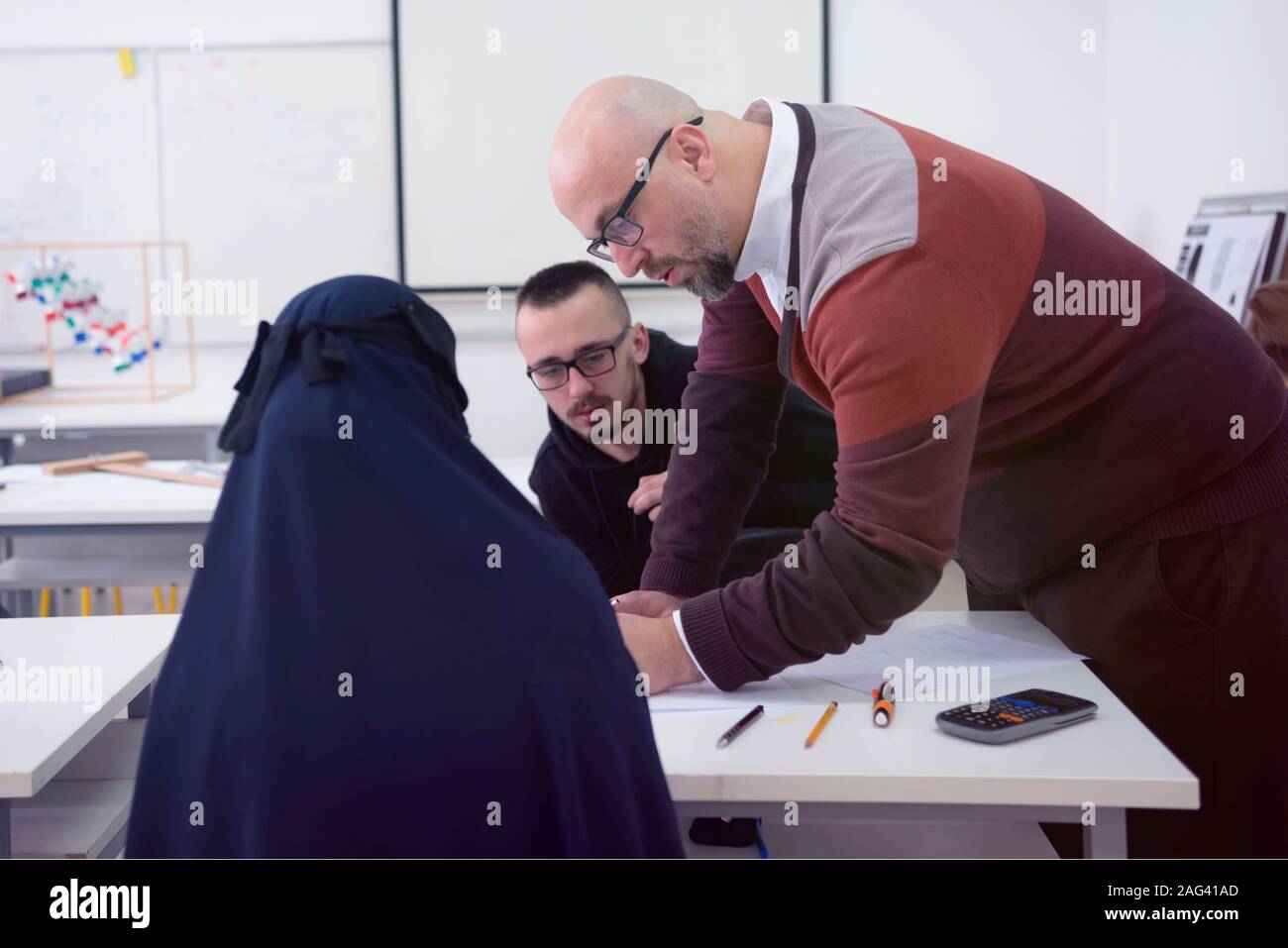 Male Professor Holding Lecture to Multi Ethnic Group of Students. Smart ...