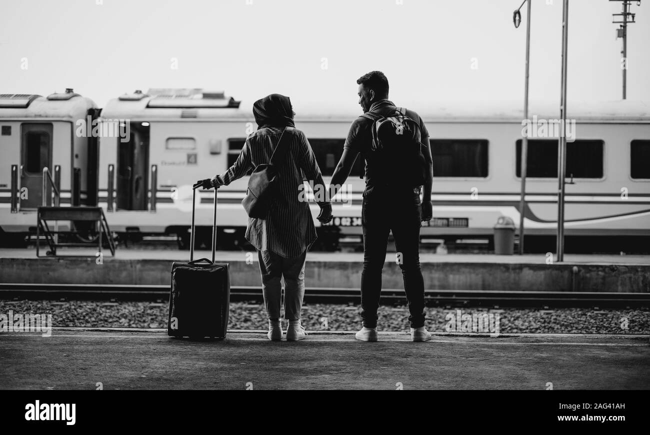 Smiling man train station Black and White Stock Photos & Images - Alamy