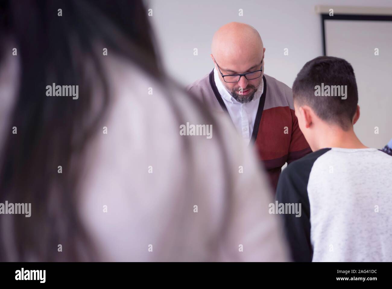Male Professor Holding Lecture to Multi Ethnic Group of Students. Smart ...