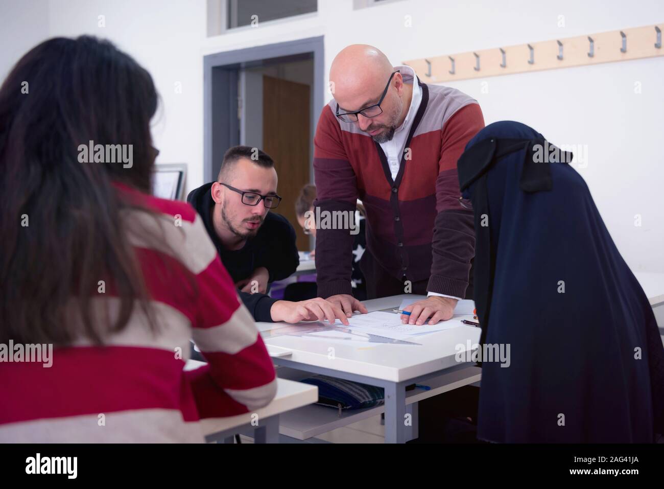 Male Professor Holding Lecture to Multi Ethnic Group of Students. Smart ...