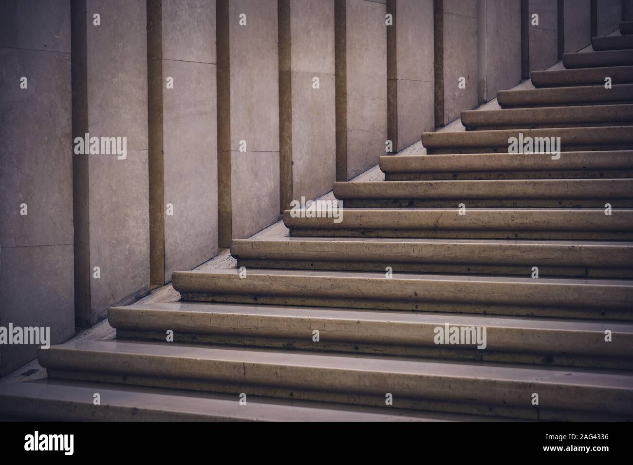 Long stairway made out of stone with stone walls Stock Photo - Alamy