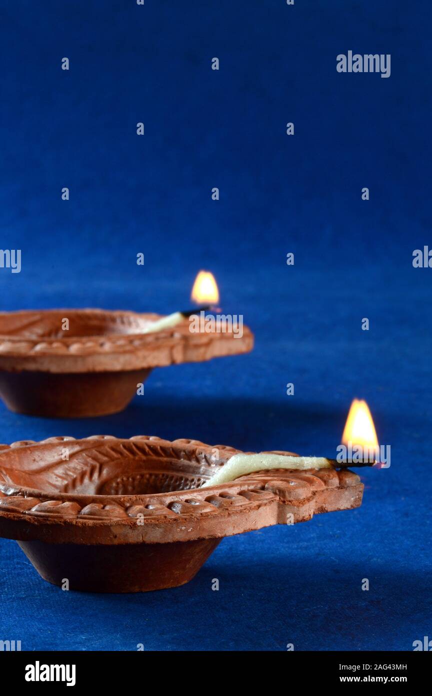 Clay diya lamps lit during diwali celebration. Greetings Card Design ...