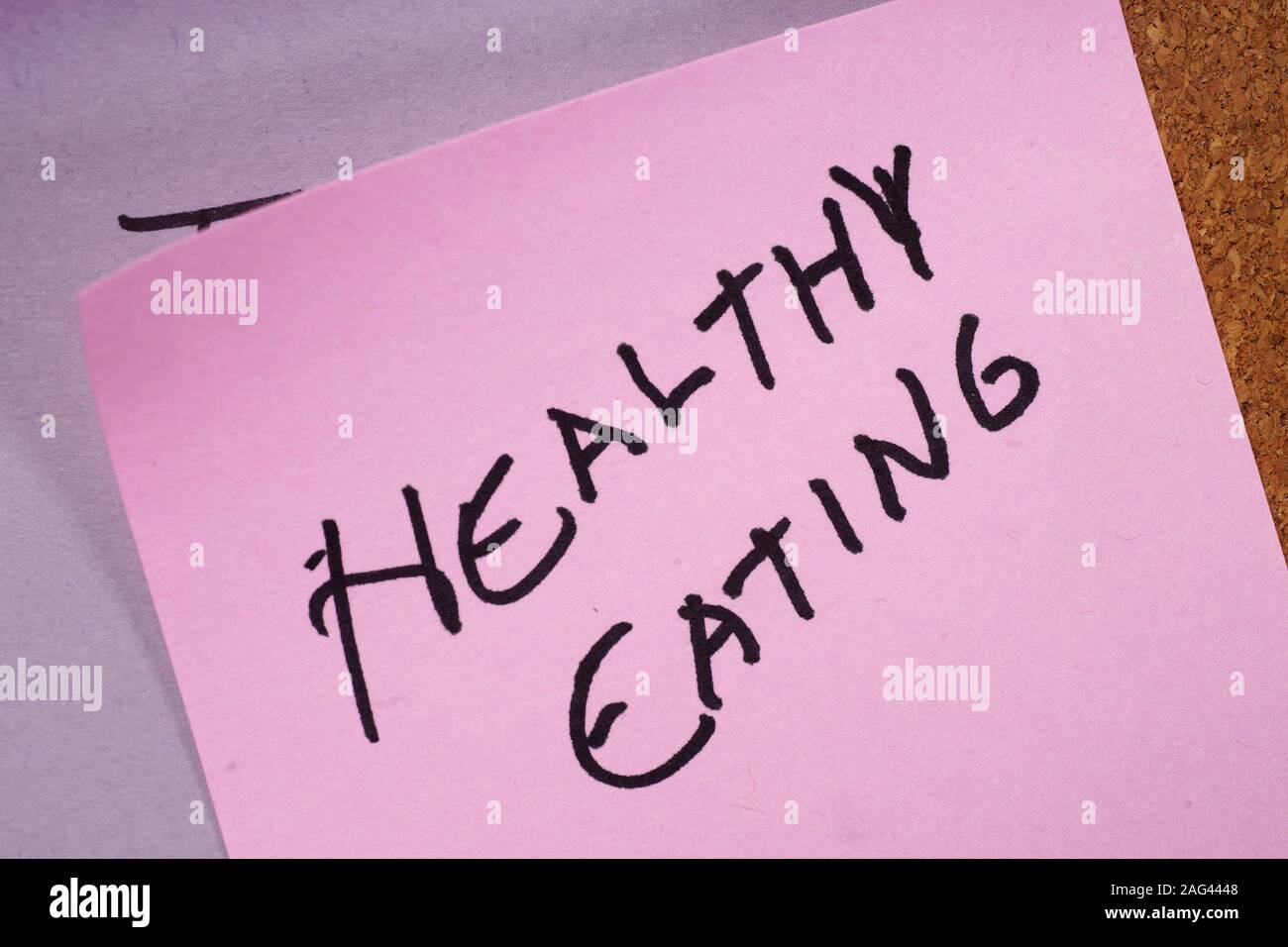 Sticky note with hand printed text about food and diet: HEALTHY EATING ...