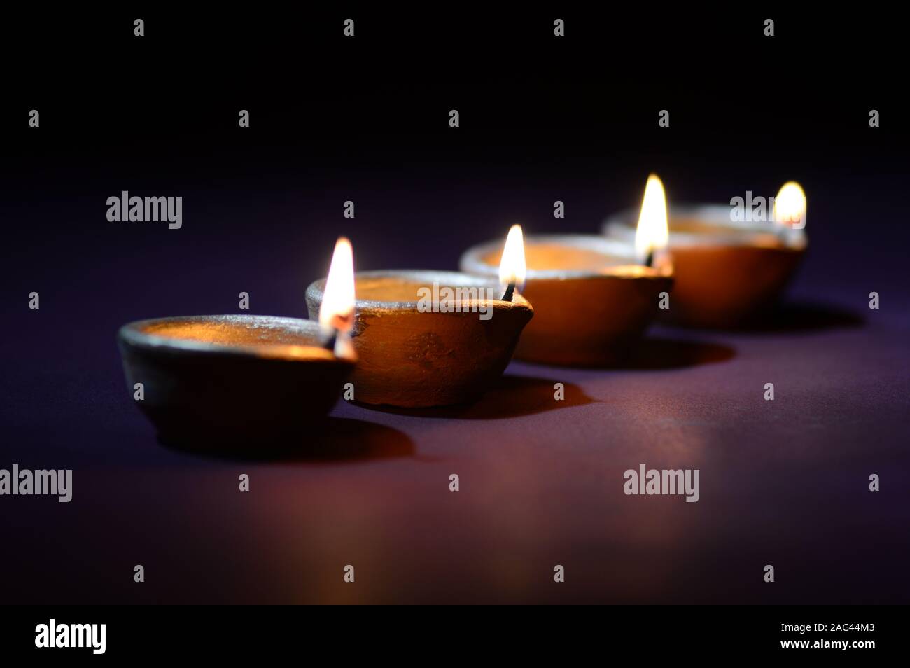 Clay diya lamps lit during diwali celebration. Greetings Card Design ...