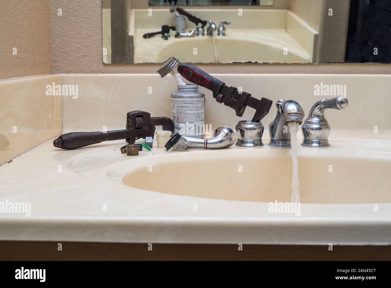 A photo of a broken faucet. Great for a plumbing ad Stock Photo - Alamy