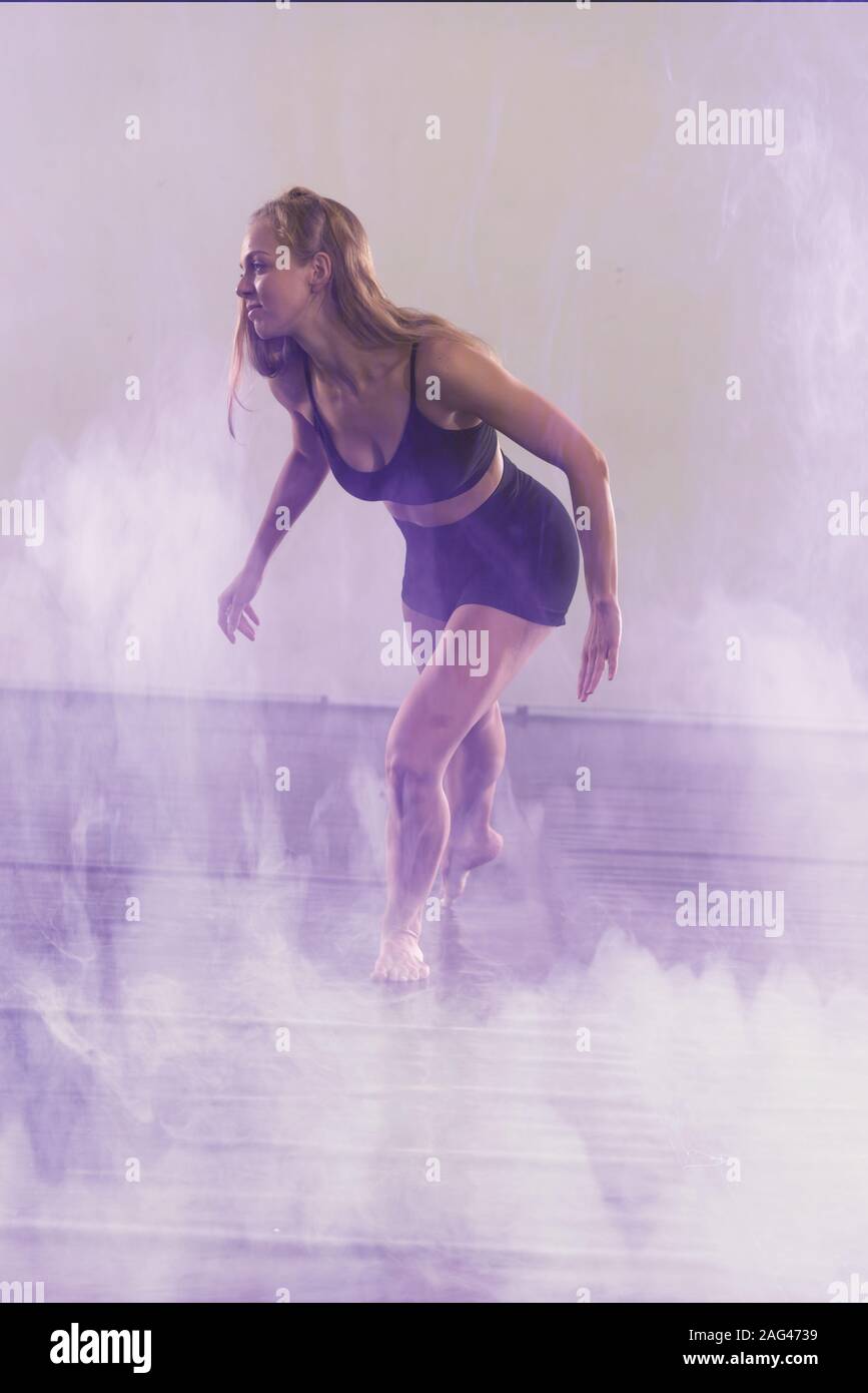Young modern dancer dancing in the studio. Sport, dancing and urban ...