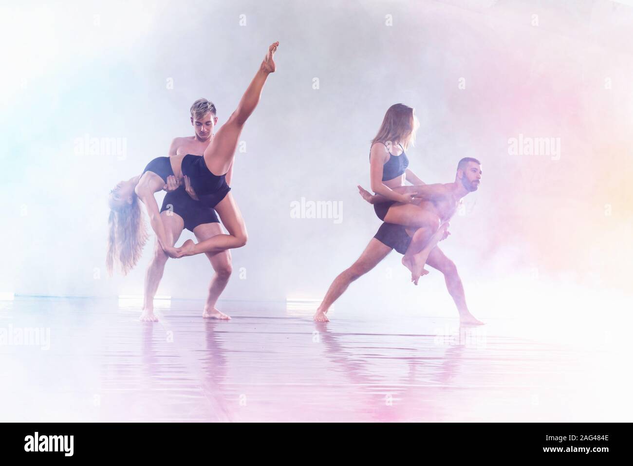 Young modern dancers dancing in the studio. Sport, dancing and urban ...