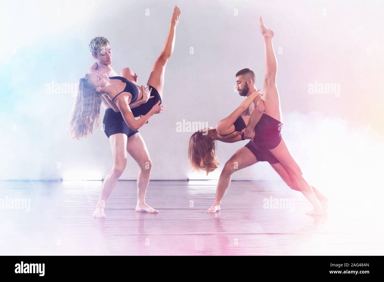 Young modern dancers dancing in the studio. Sport, dancing and urban ...