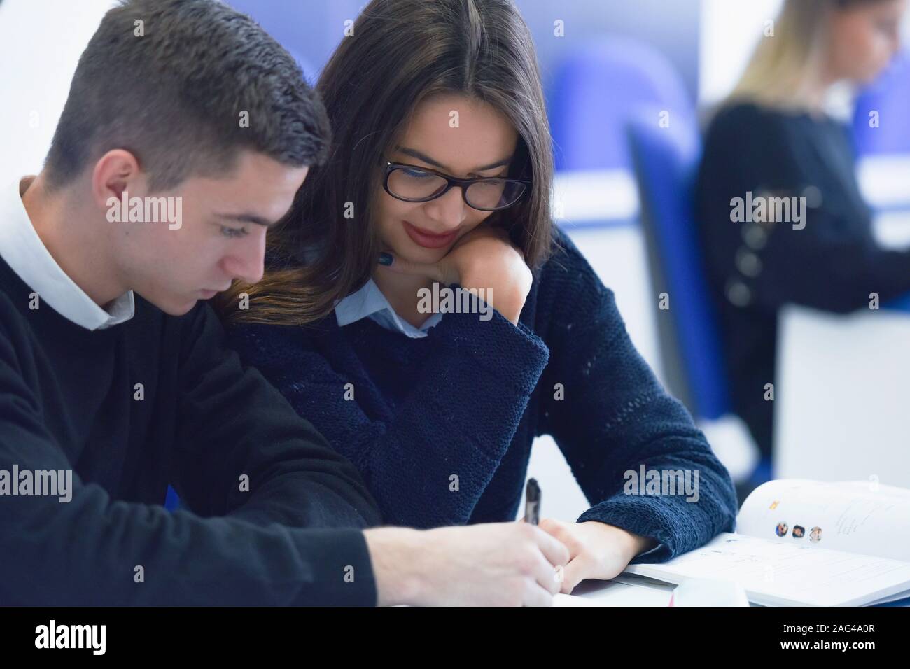 Students during the class. Resolving problems together. Team work ...