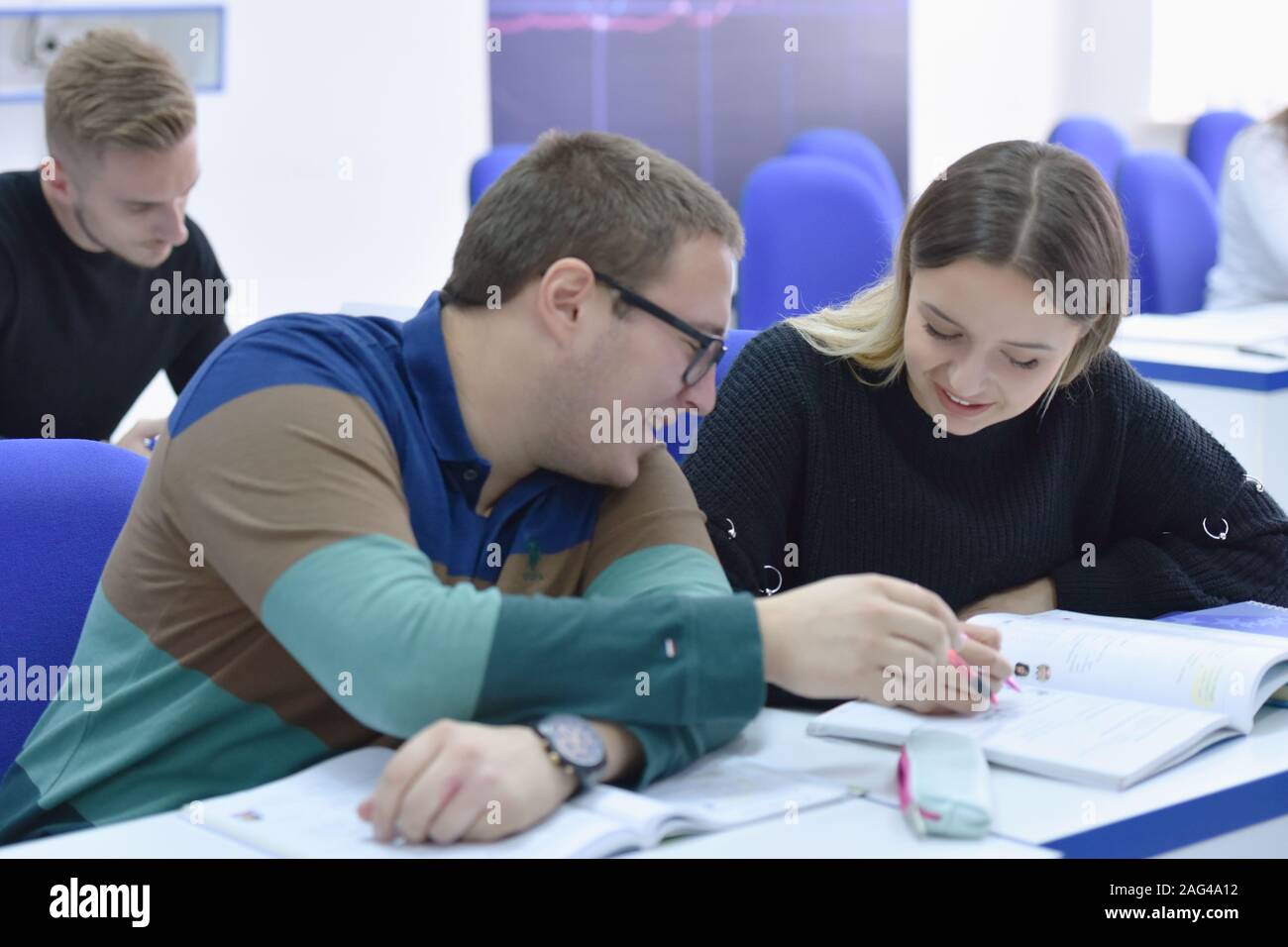 Students during the class. Resolving problems together. Team work ...