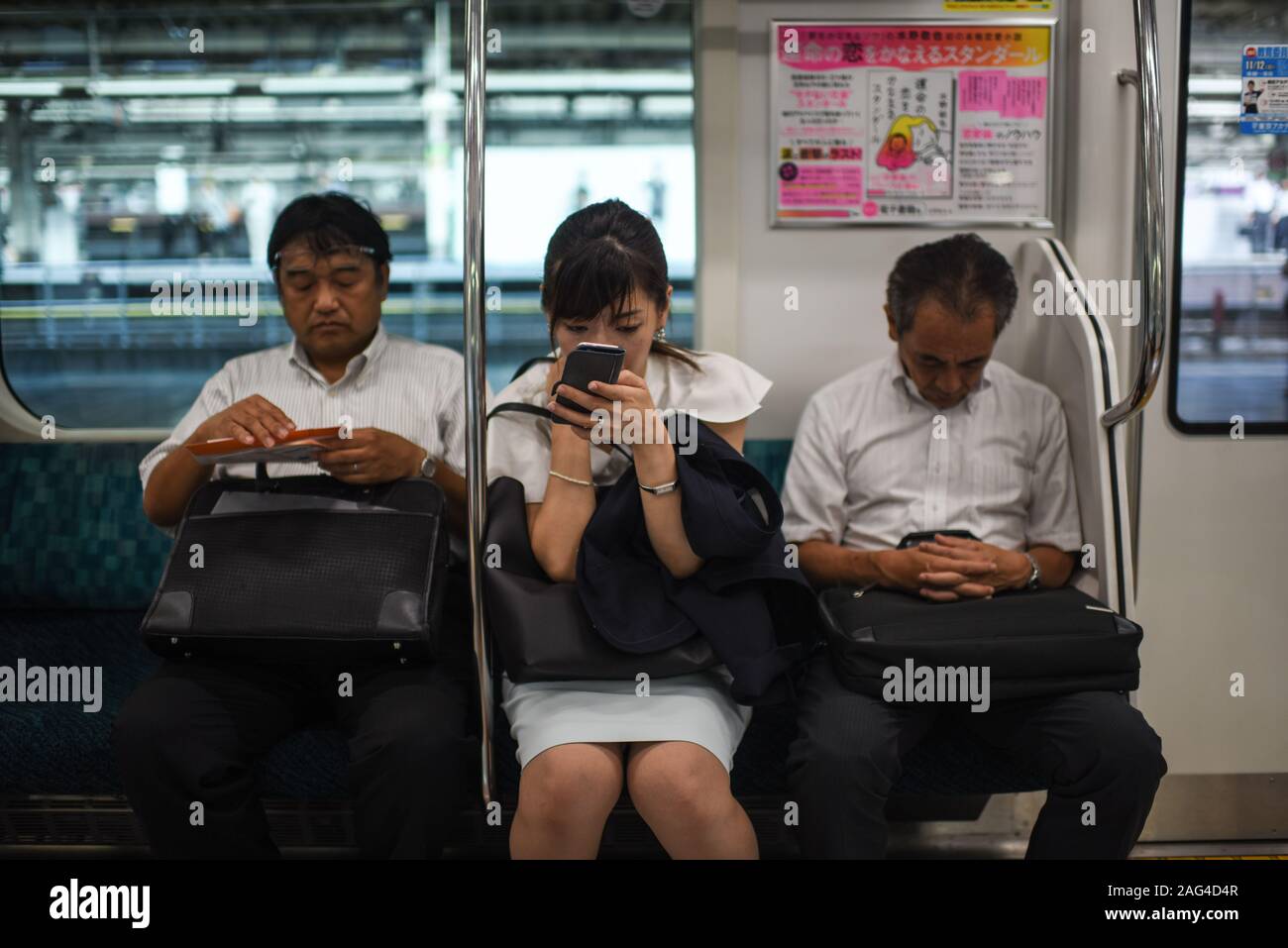 Japanese subway passengers hi-res stock photography and images - Alamy