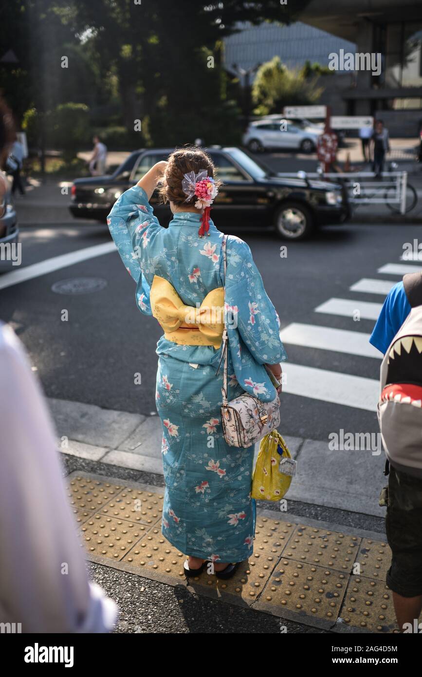 Western woman dressed in traditional Japanese clothes, Tokyo, Japan ...