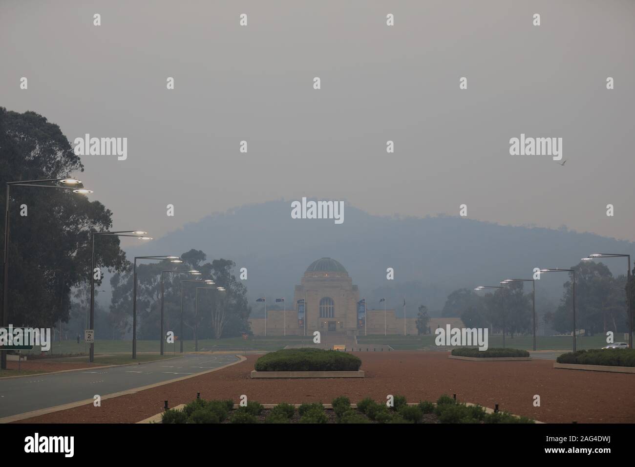 Canberra. 17th Dec, 2019. Photo taken on Dec. 17, 2019 shows the smoke ...
