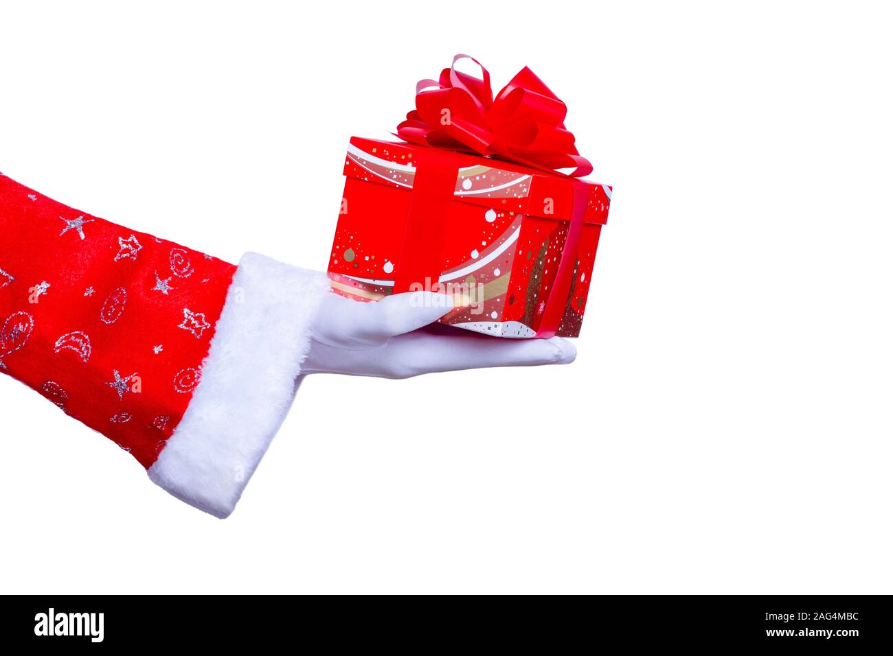 christmas santa claus hand with a present gift box as a holiday season ...