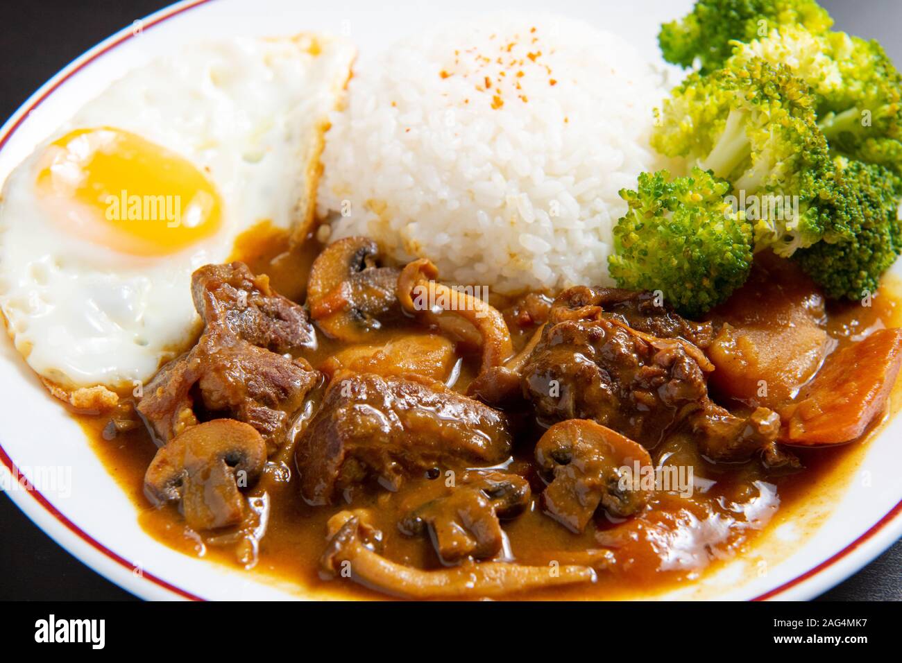 beef Curry Rice on black wooden background ( Onsen tamago, Potato ...