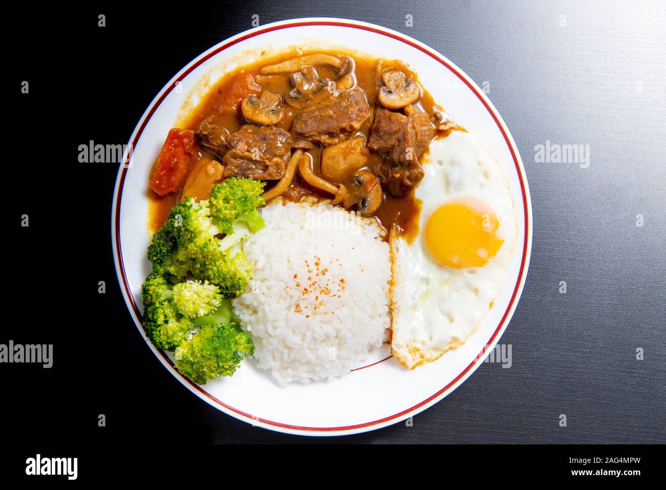 beef Curry Rice on black wooden background ( Onsen tamago, Potato ...