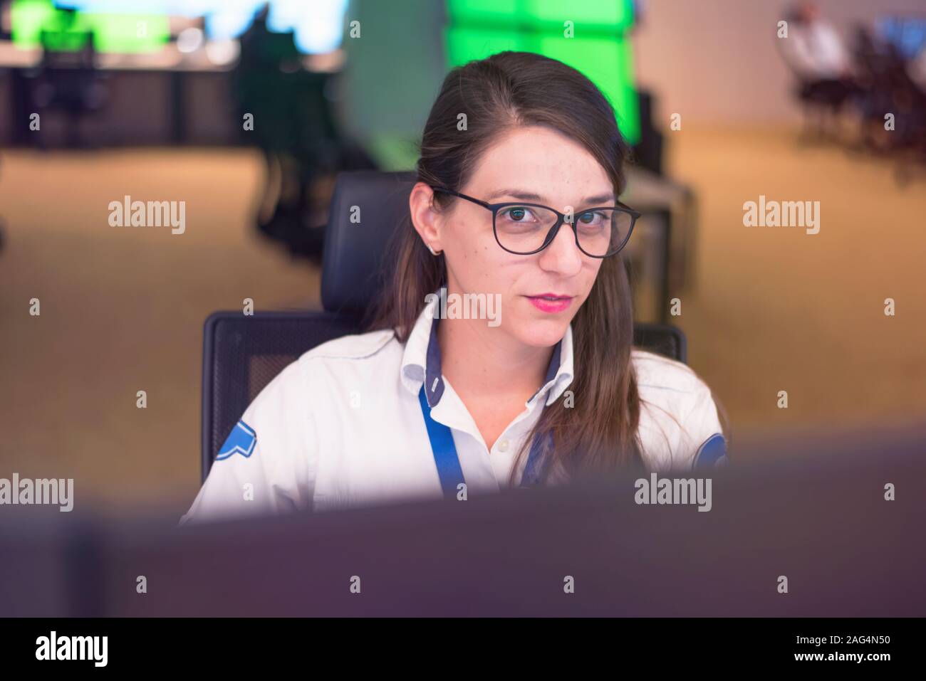 Security guard monitoring modern CCTV cameras in surveillance room ...