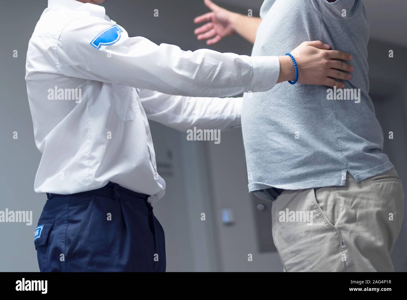 Pat down hi-res stock photography and images - Alamy