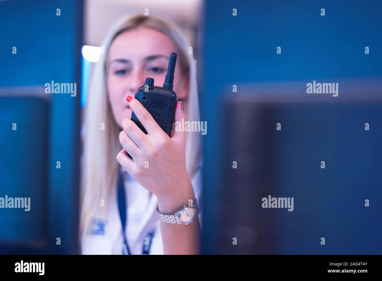 Security guard monitoring modern CCTV cameras in surveillance room ...