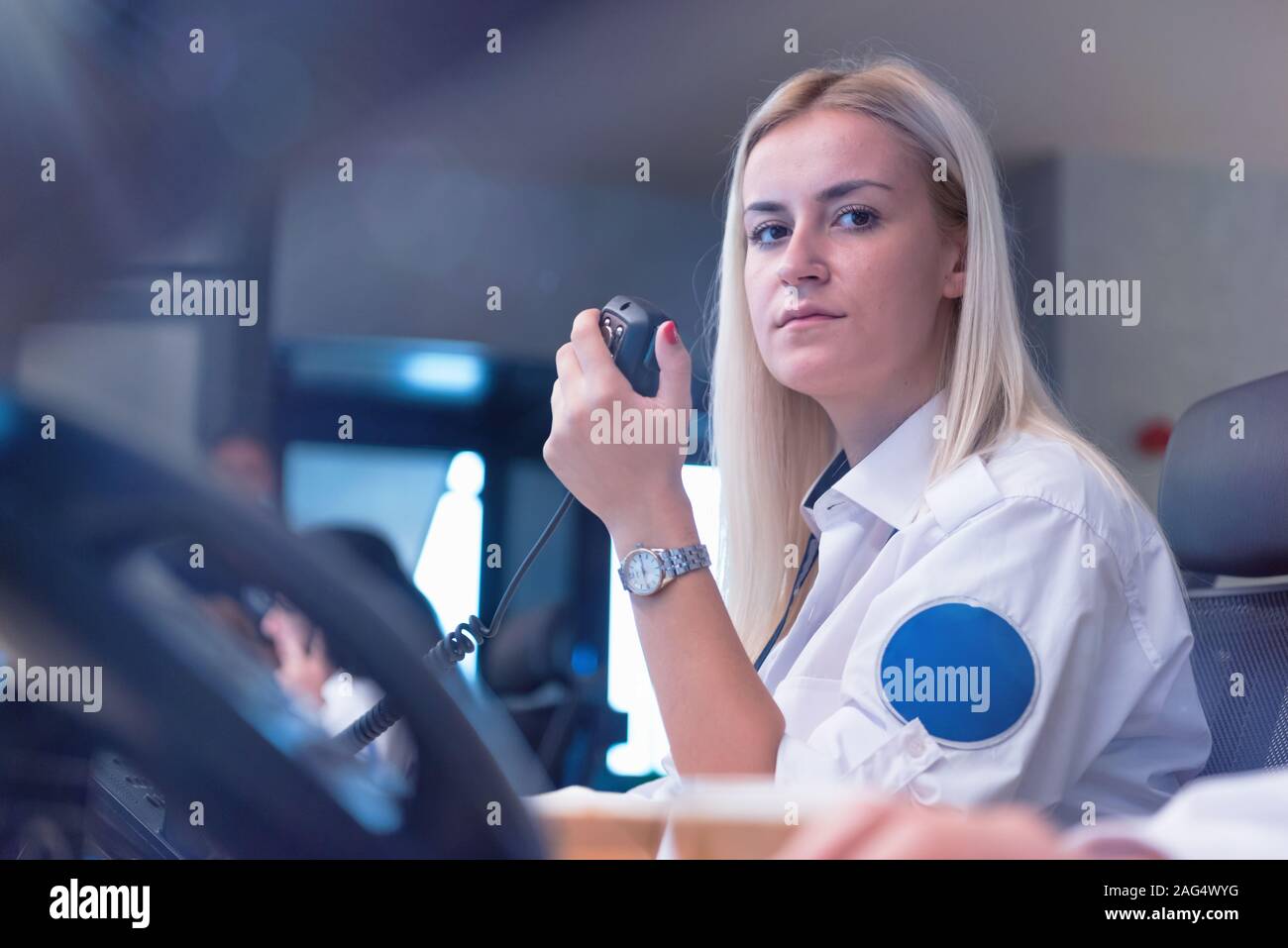 Security guard monitoring modern CCTV cameras in surveillance room ...