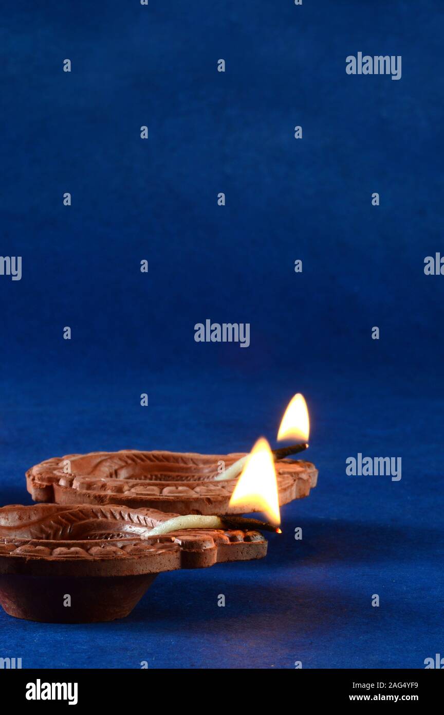 Clay diya lamps lit during diwali celebration. Greetings Card Design ...