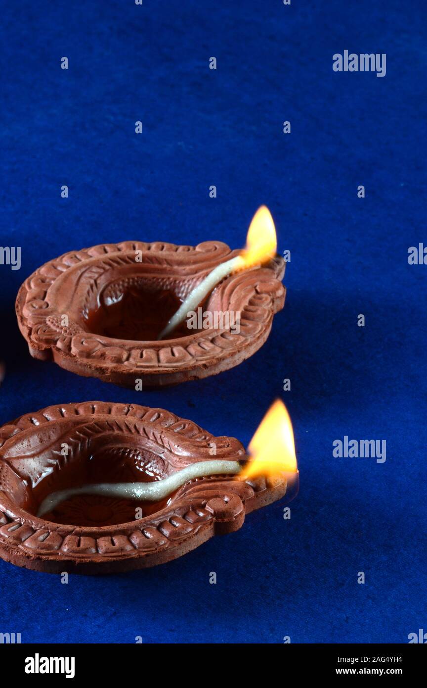 Clay diya lamps lit during diwali celebration. Greetings Card Design ...