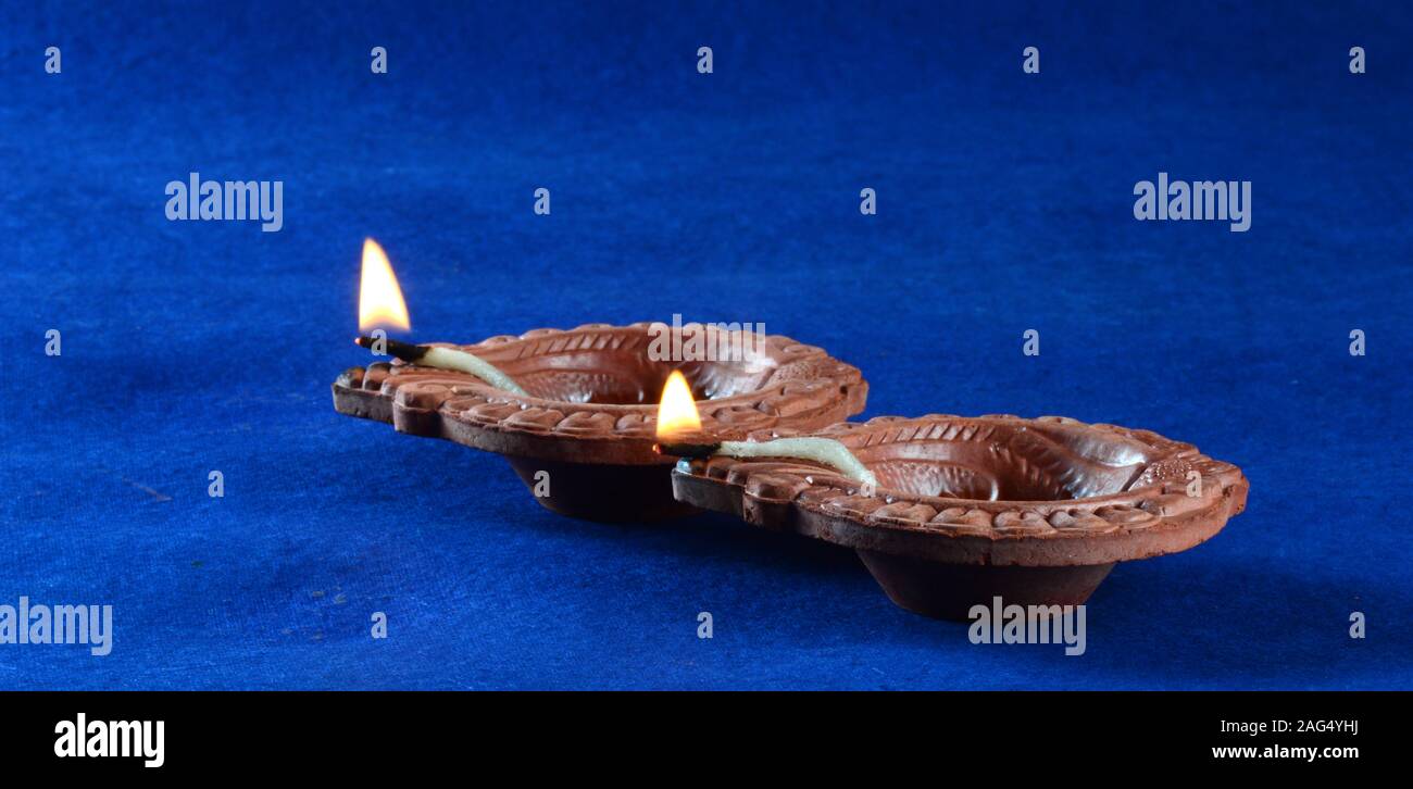 Clay diya lamps lit during diwali celebration. Greetings Card Design ...