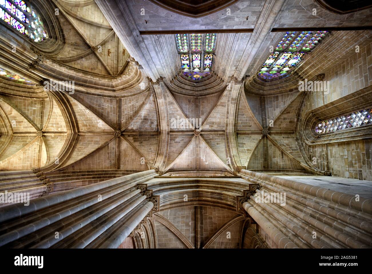 The ceiling in the interior of a historic cathedral with arches and ...