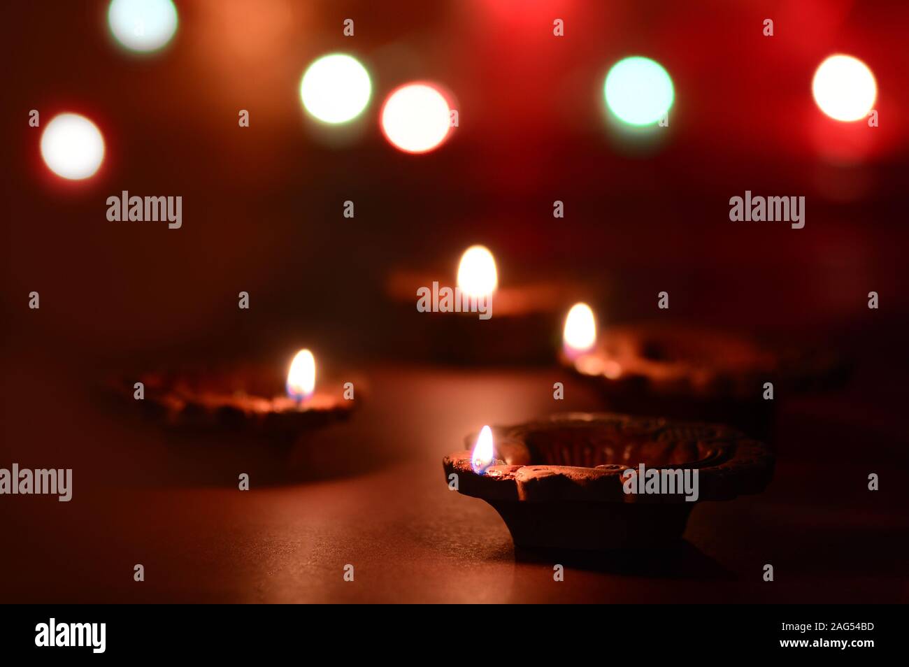 Clay diya lamps lit during Diwali Celebration. Greetings Card Design ...