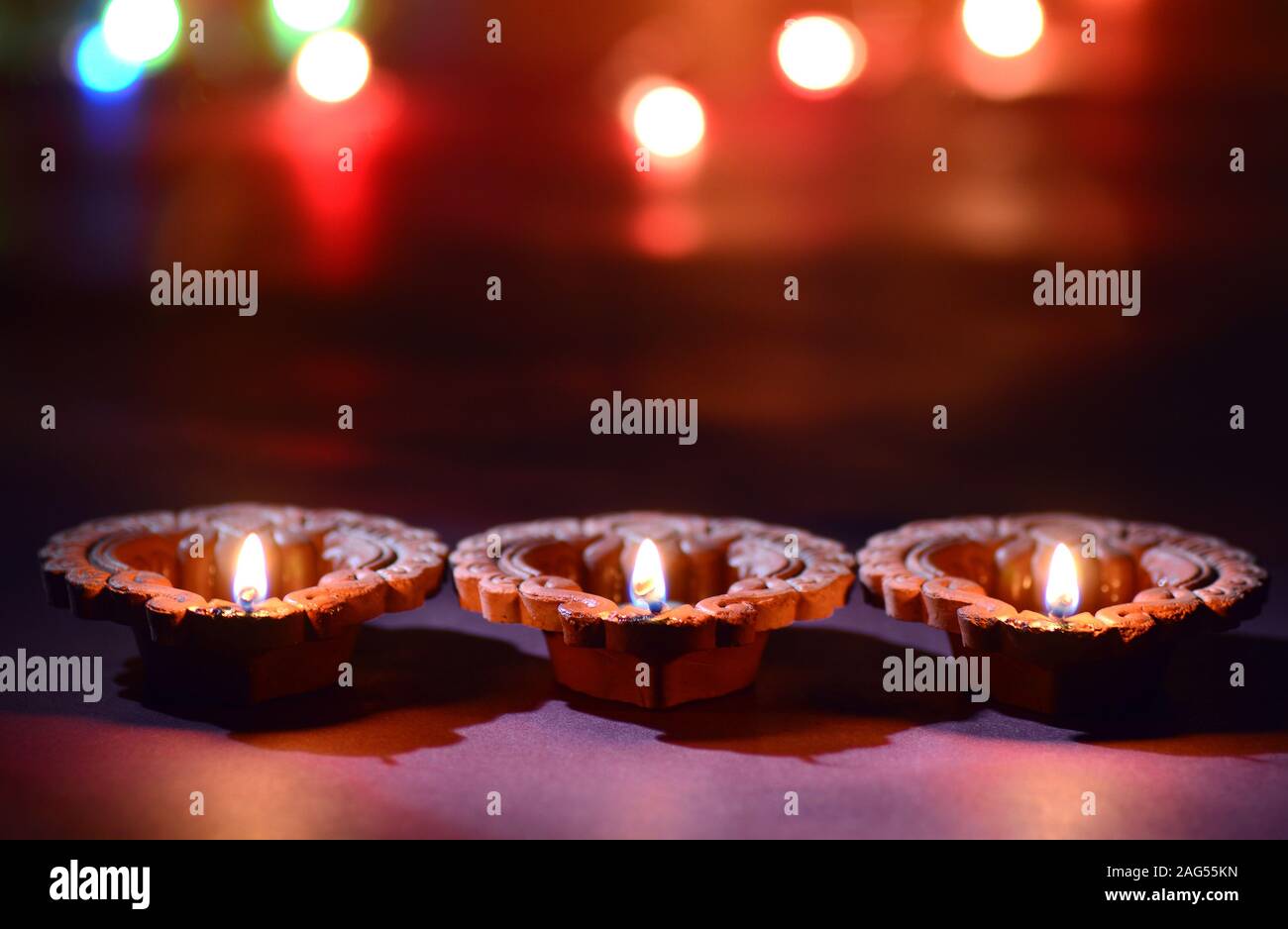 Clay diya lamps lit during Diwali Celebration. Greetings Card Design ...