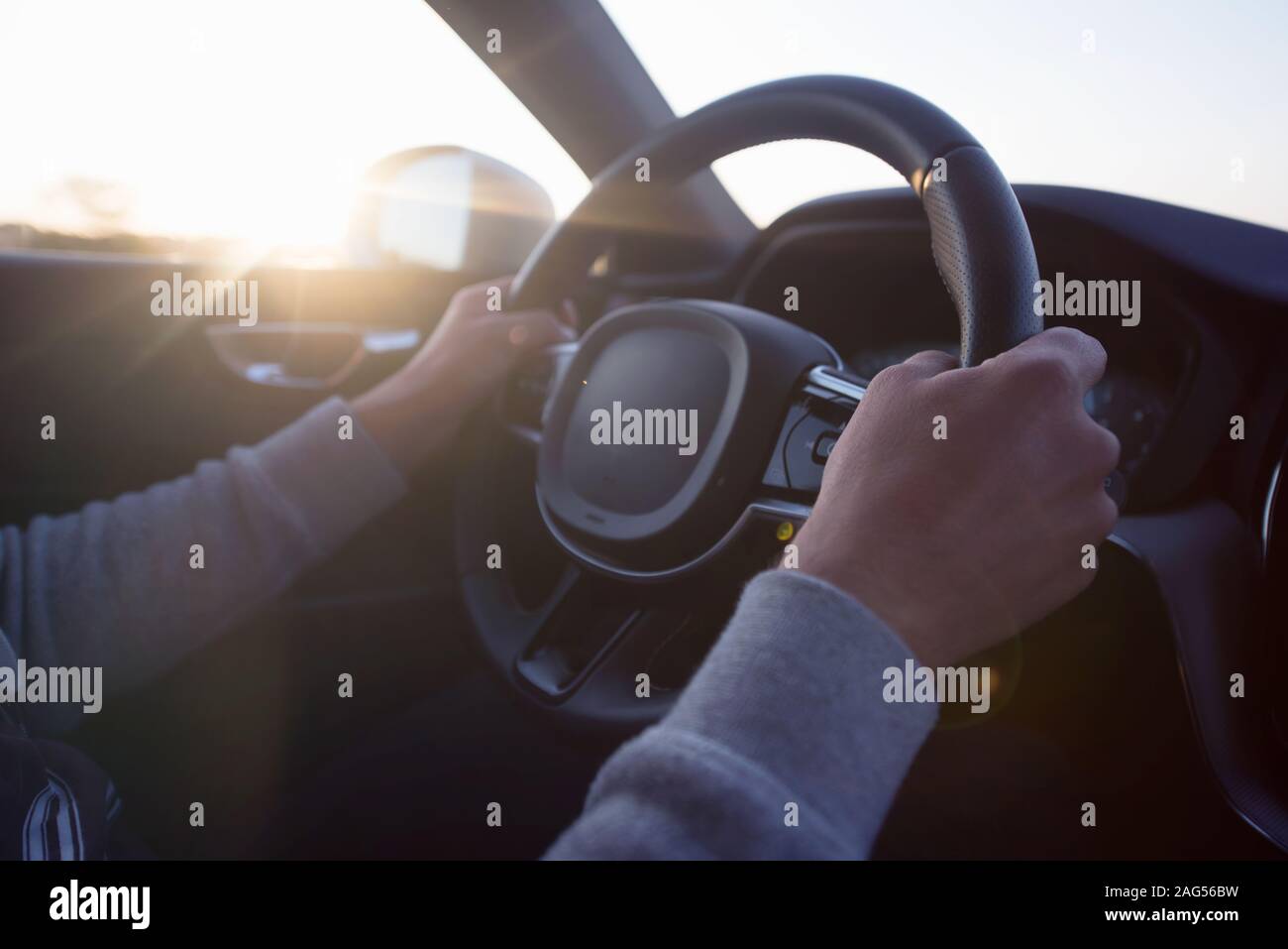 Man driving a car. Success in motion. Handsome young man driving a car ...