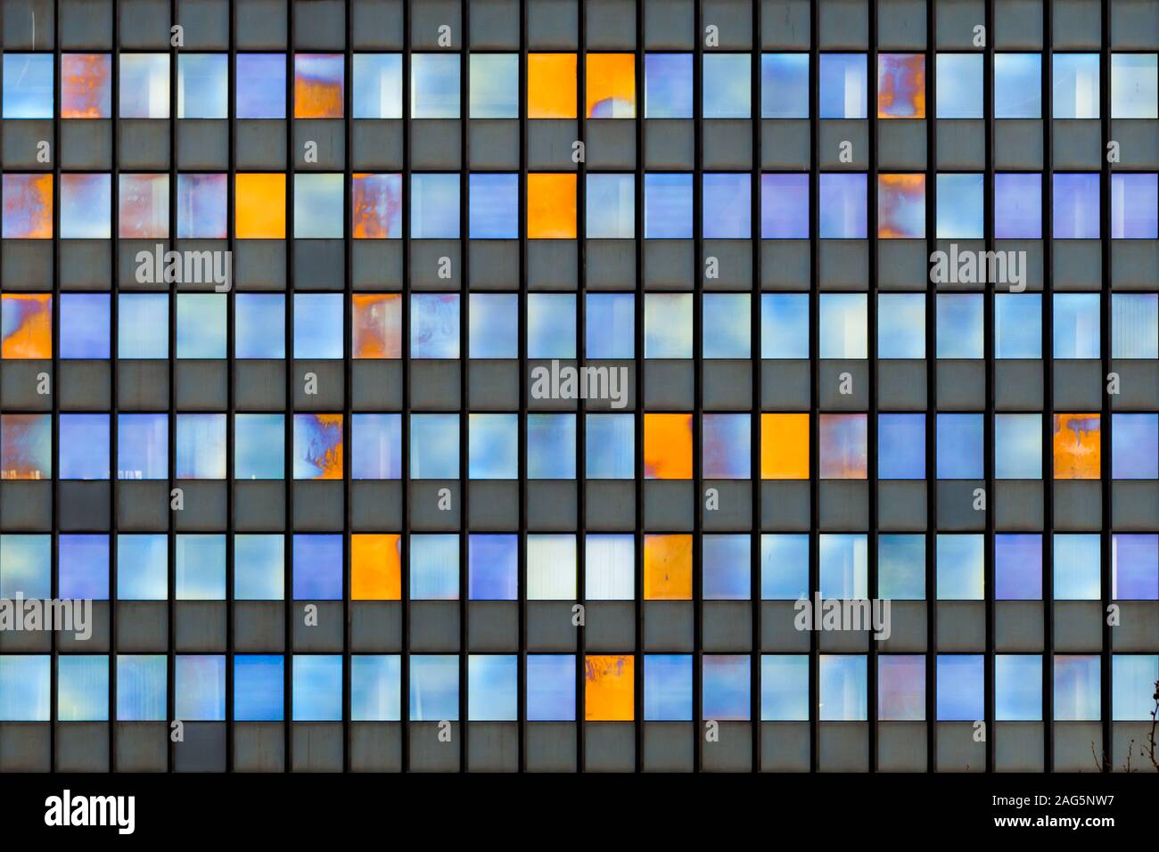 Modern building with creative yellow and blue windows looking like a ...