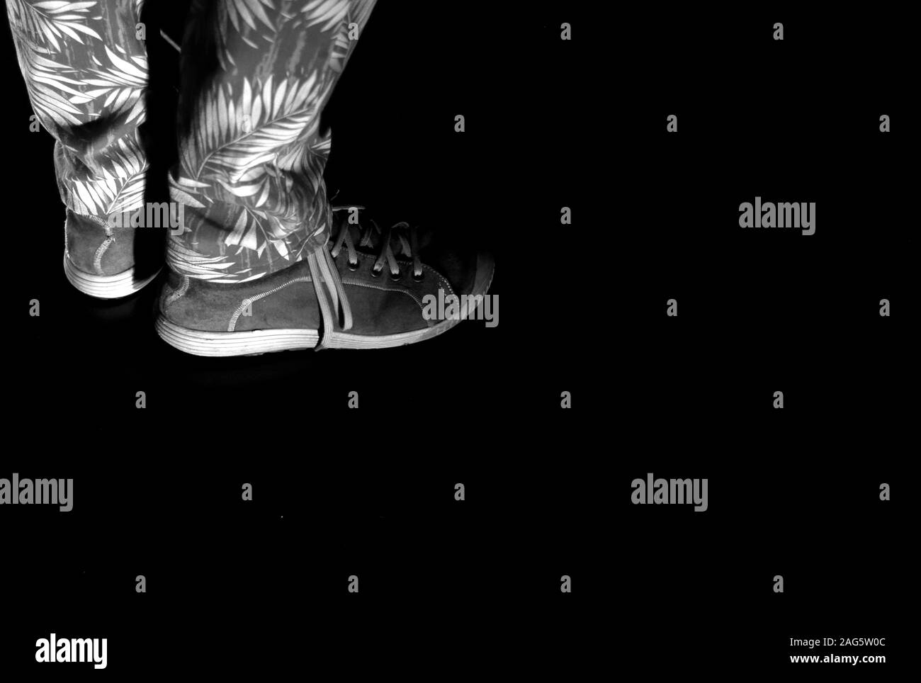 Gray pants on black Black and White Stock Photos & Images - Alamy