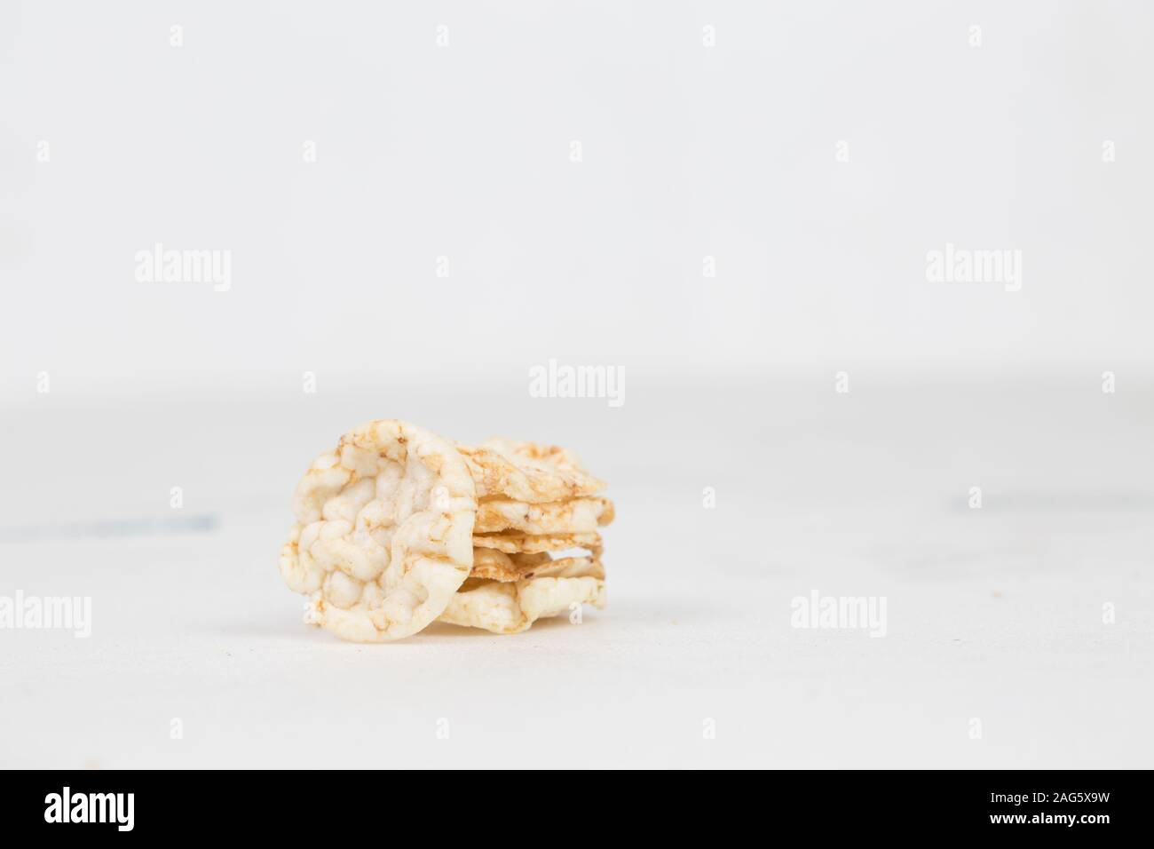 Closeup shot of a stack of pignolia isolated on a white background ...