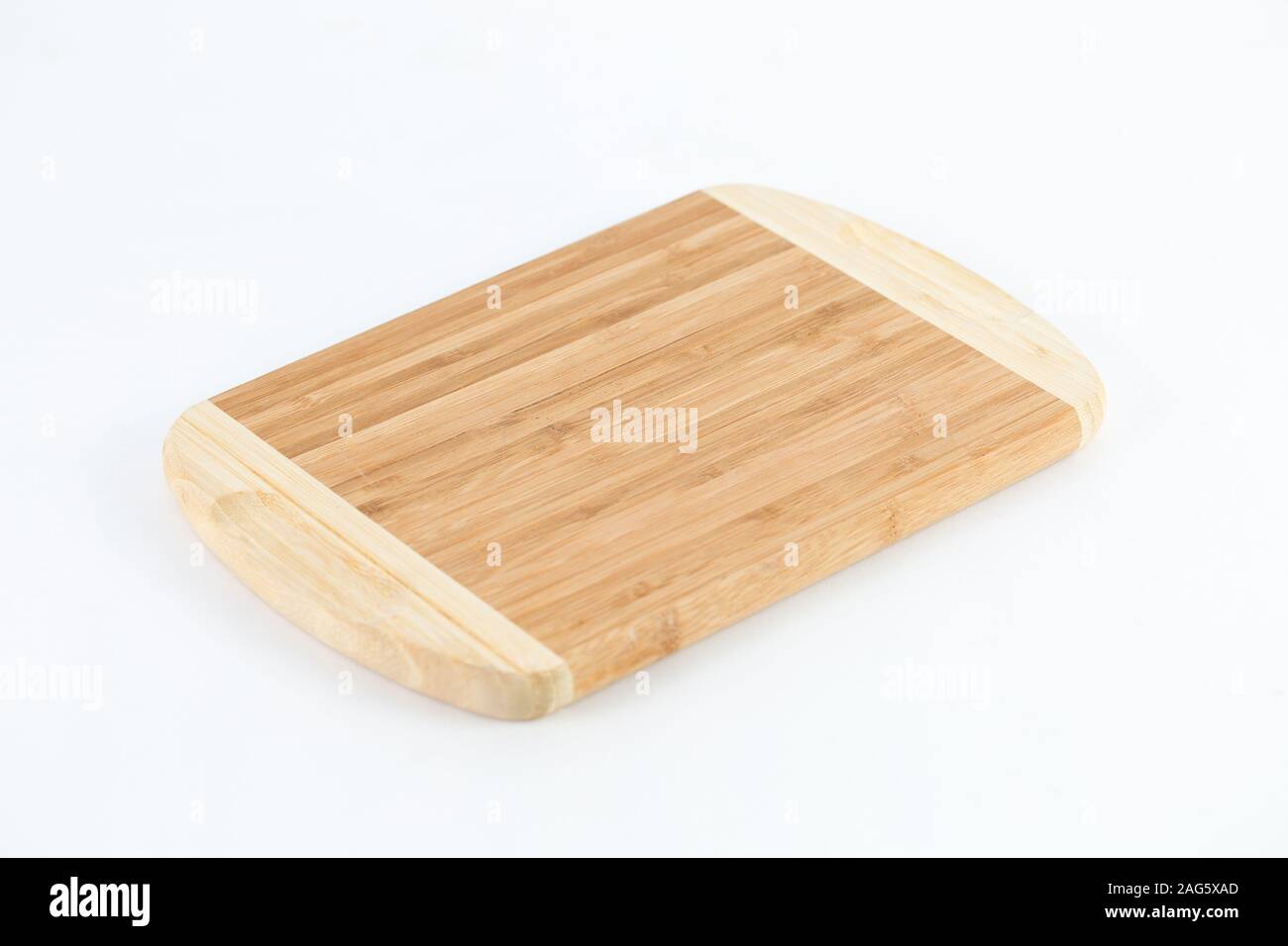 Wooden chopping board isolated on a white background Stock Photo - Alamy