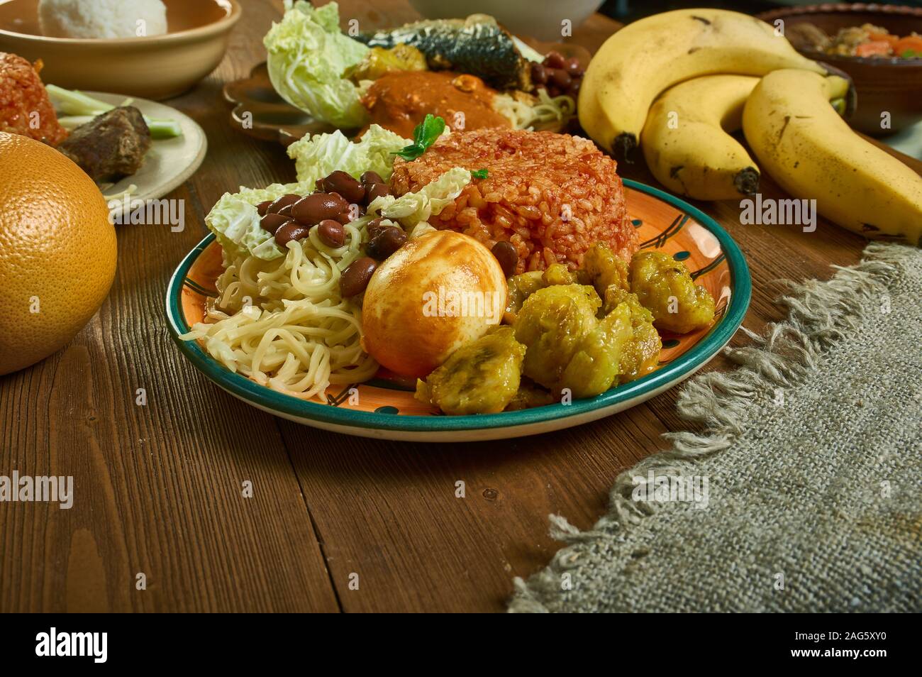 Waakye, Ghanaian cuisine, cooked rice and beans, mixed with boiled eggs ...