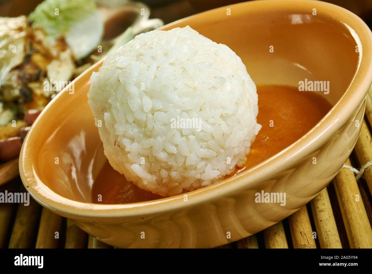 Omo Tuo and Groundnut Soup, staple food made with rice, Ghanaian ...