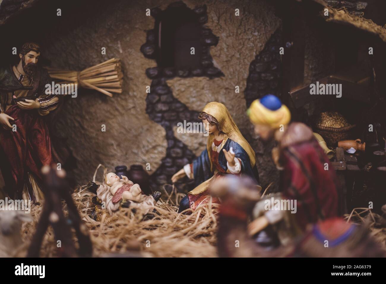 Closeup shot of beautiful small holy figures representing the birth of ...