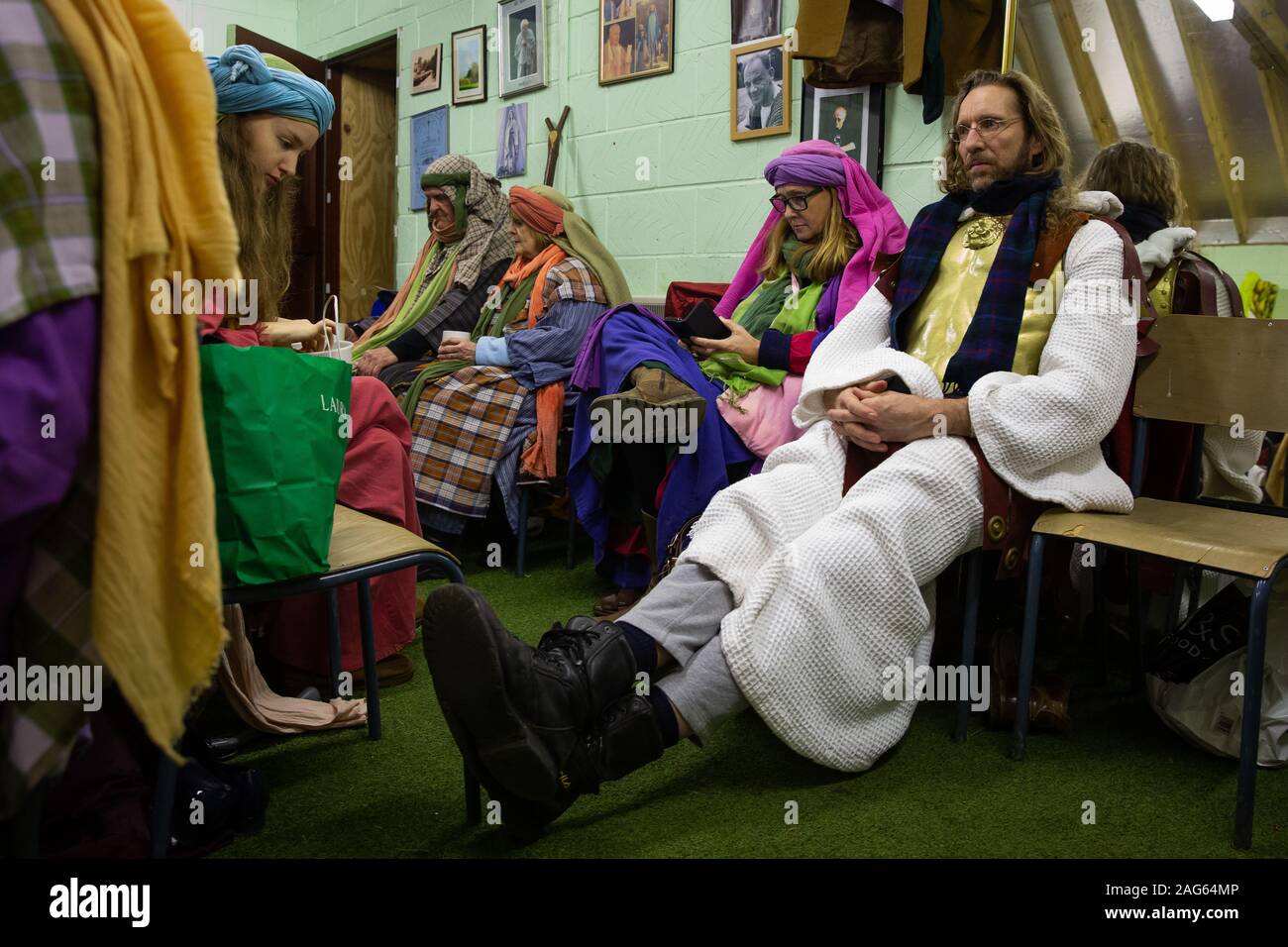 Cast members relax backstage before the dress rehearsal for the ...