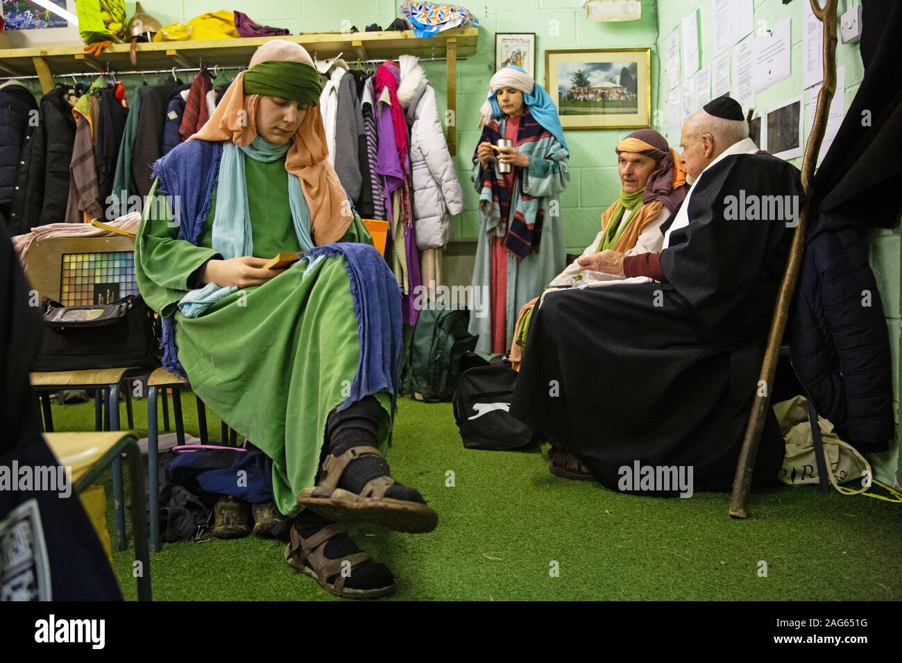 Cast members relax backstage before the dress rehearsal for the ...
