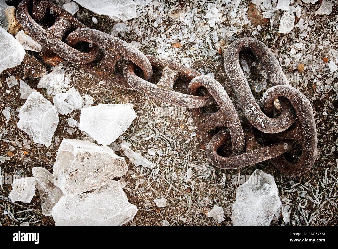 Old rusty chain covered in Icy frost Stock Photo - Alamy