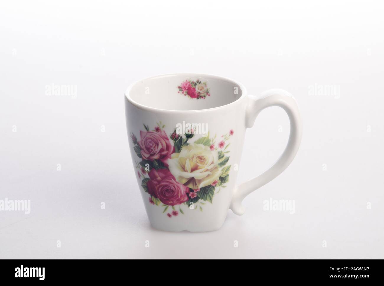 cup or hand painted flower ceramic mug on the background new Stock ...
