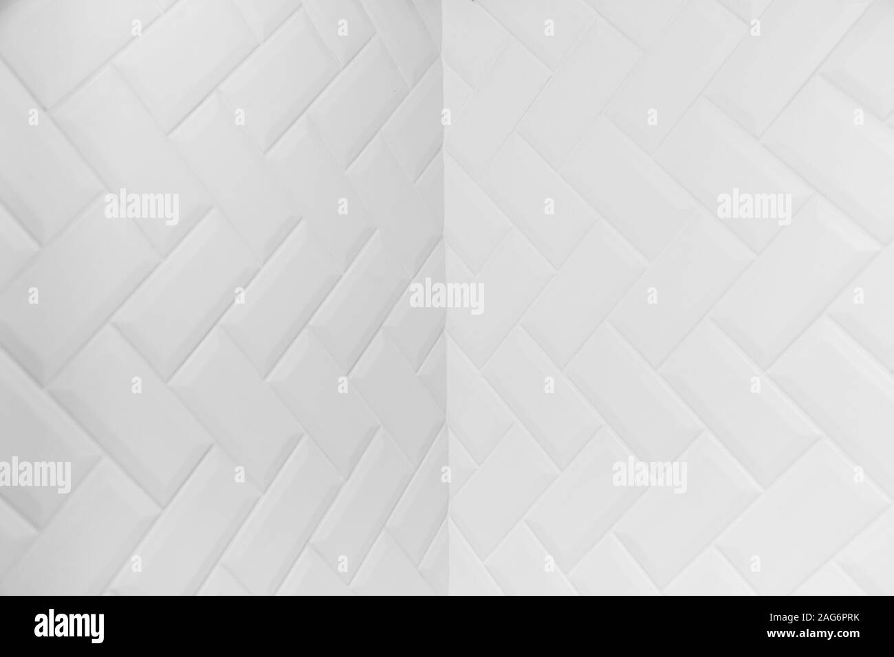 Internal angle of beveled white matt ceramic tiles pattern herringbone ...