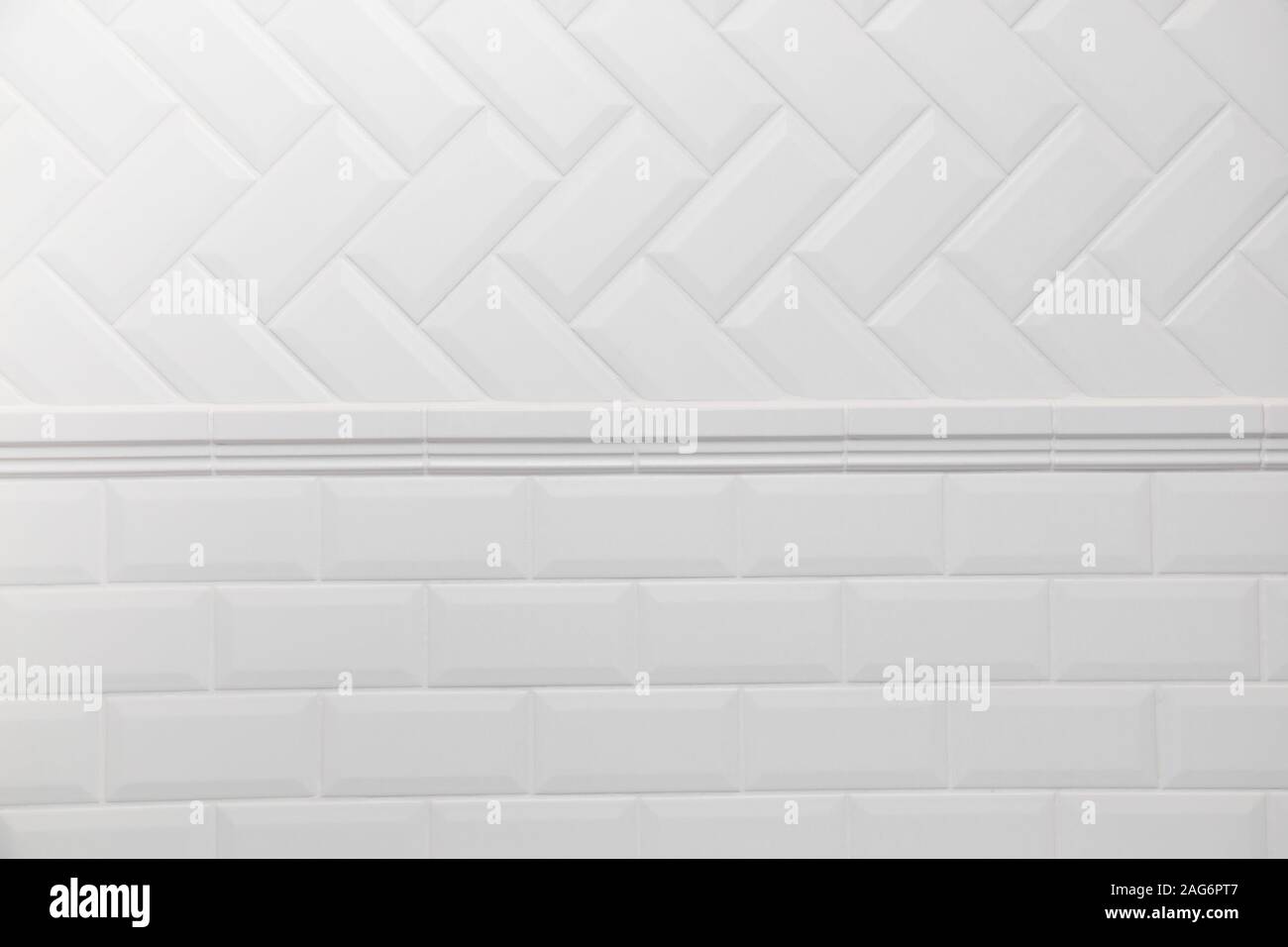 Bathroom wall tiled in scandinavian style with white grouting ...